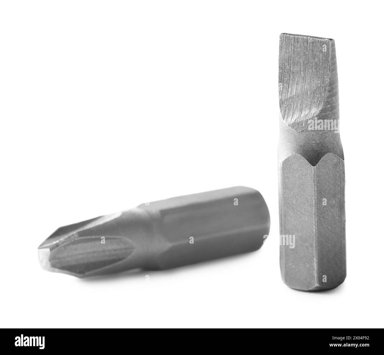 Different metal screwdriver bits on white background Stock Photo - Alamy