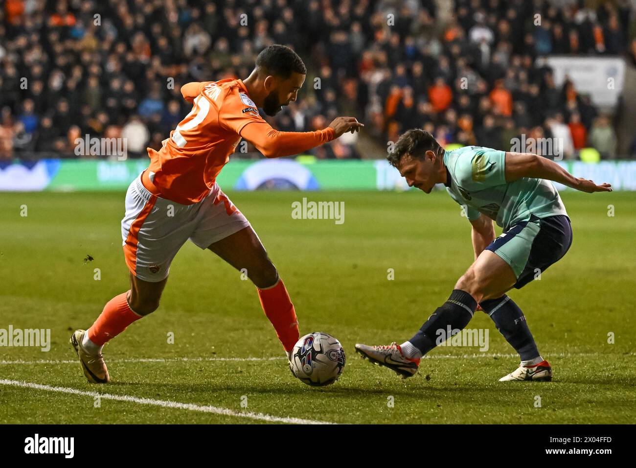 CJ Hamilton of Blackpool takes on Carl Johnston of Fleetwood Townduring ...