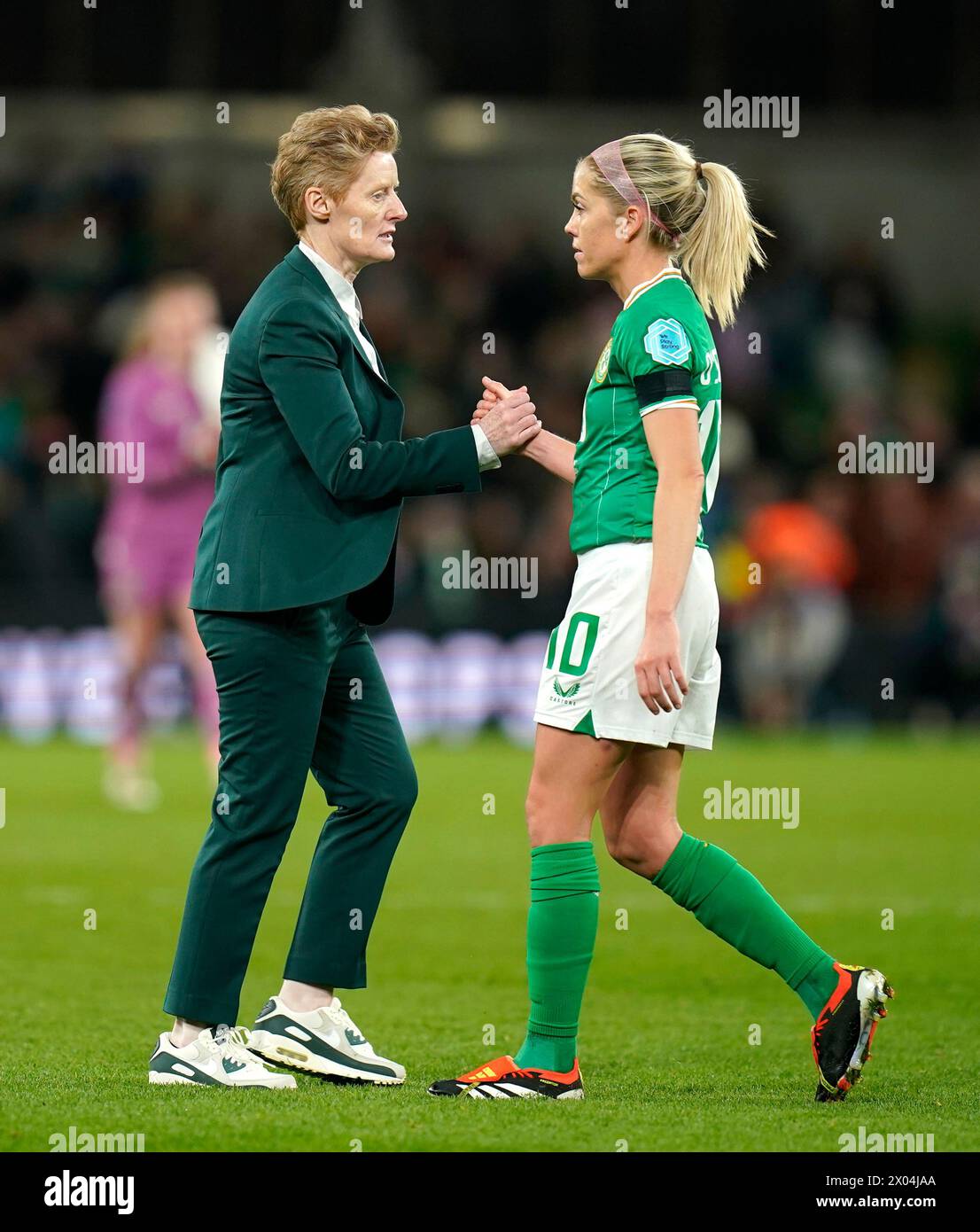 Republic of Ireland head coach Eileen Gleeson greets Denise O'Sullivan ...