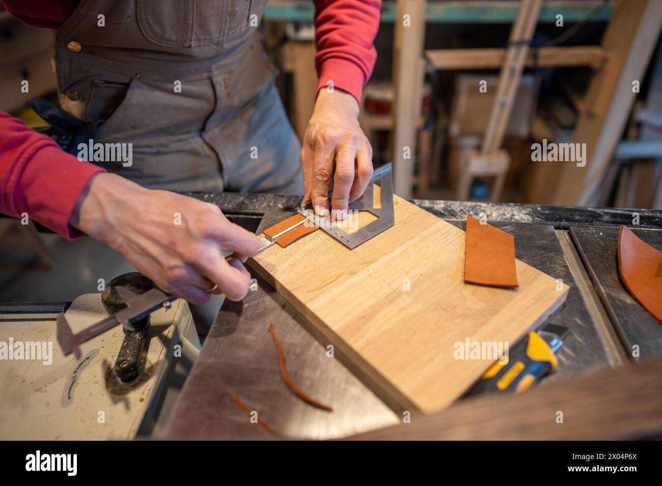 Male hands cutting leather skin. Master shoemaker cobbler professional ...