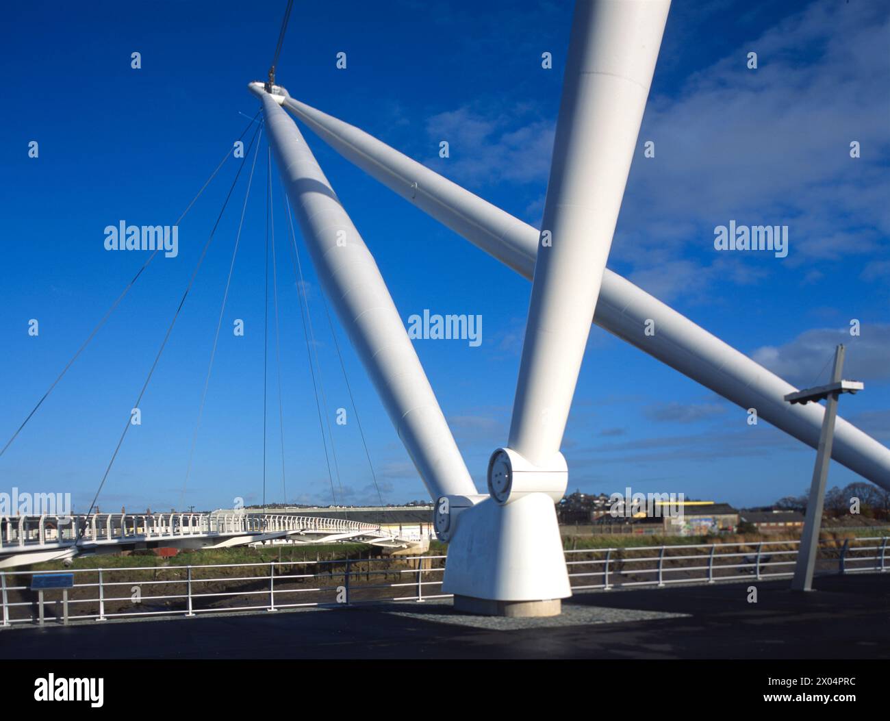 Iconic pedestrian cable stayed footbridge over the river Usk at Newport ...