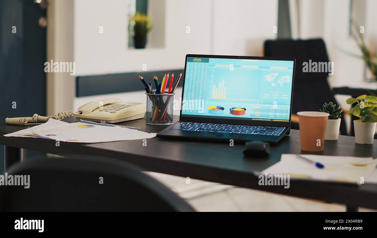 Financial stock market diagrams with charts and stock figures on laptop ...