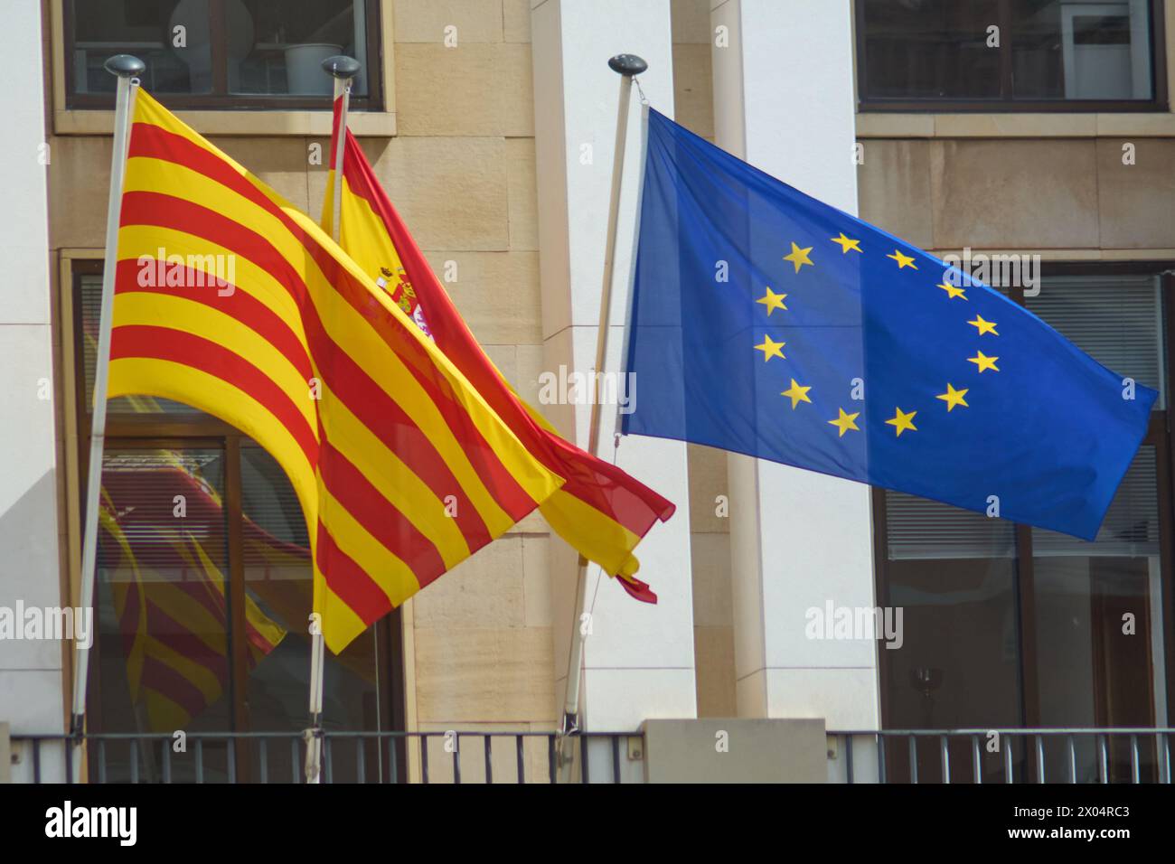 A display of unity and diversity as the flags of Spain, Catalonia, and ...