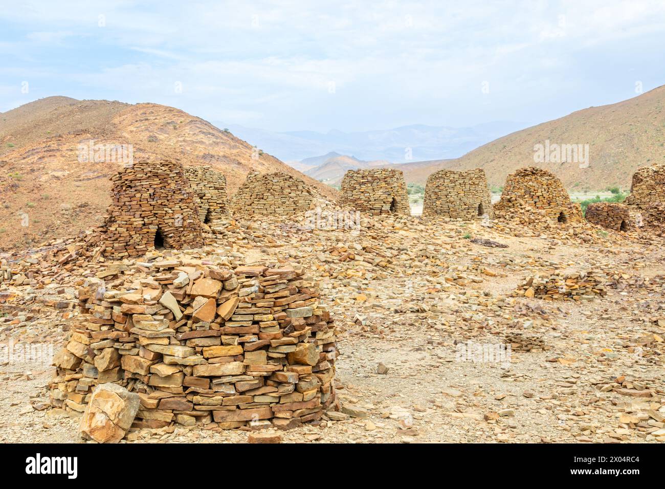 Geoup of ancient stone beehive tombs, archaeological site near al-Ayn ...