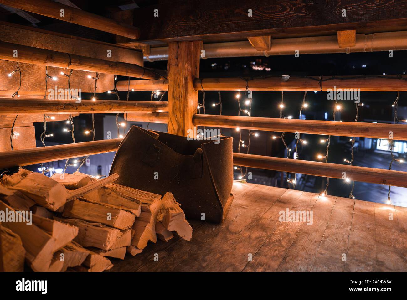 Rustic Wooden Box with Firewood and String Lights in Cozy Indoor Cabin ...