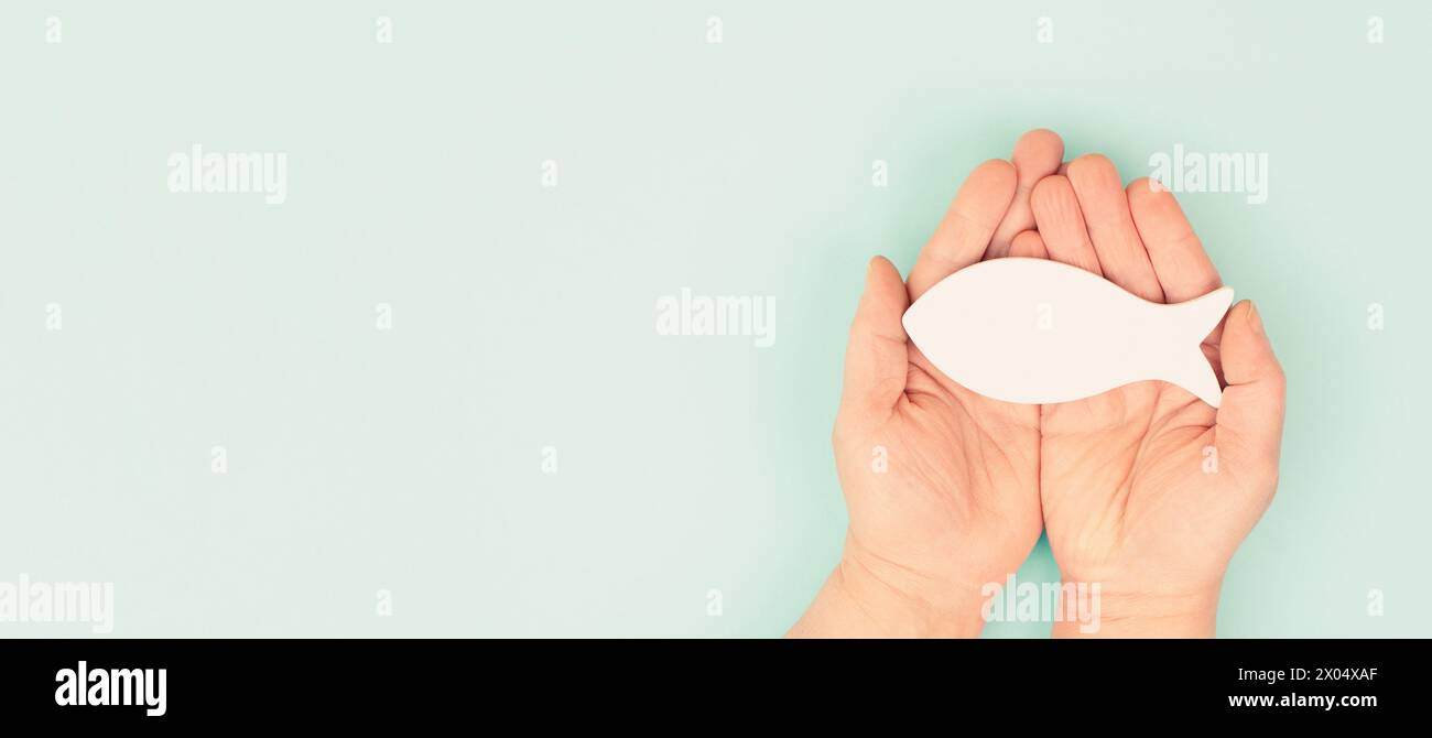 Confirmation, communion and baptism, hand holding fish, religious ...