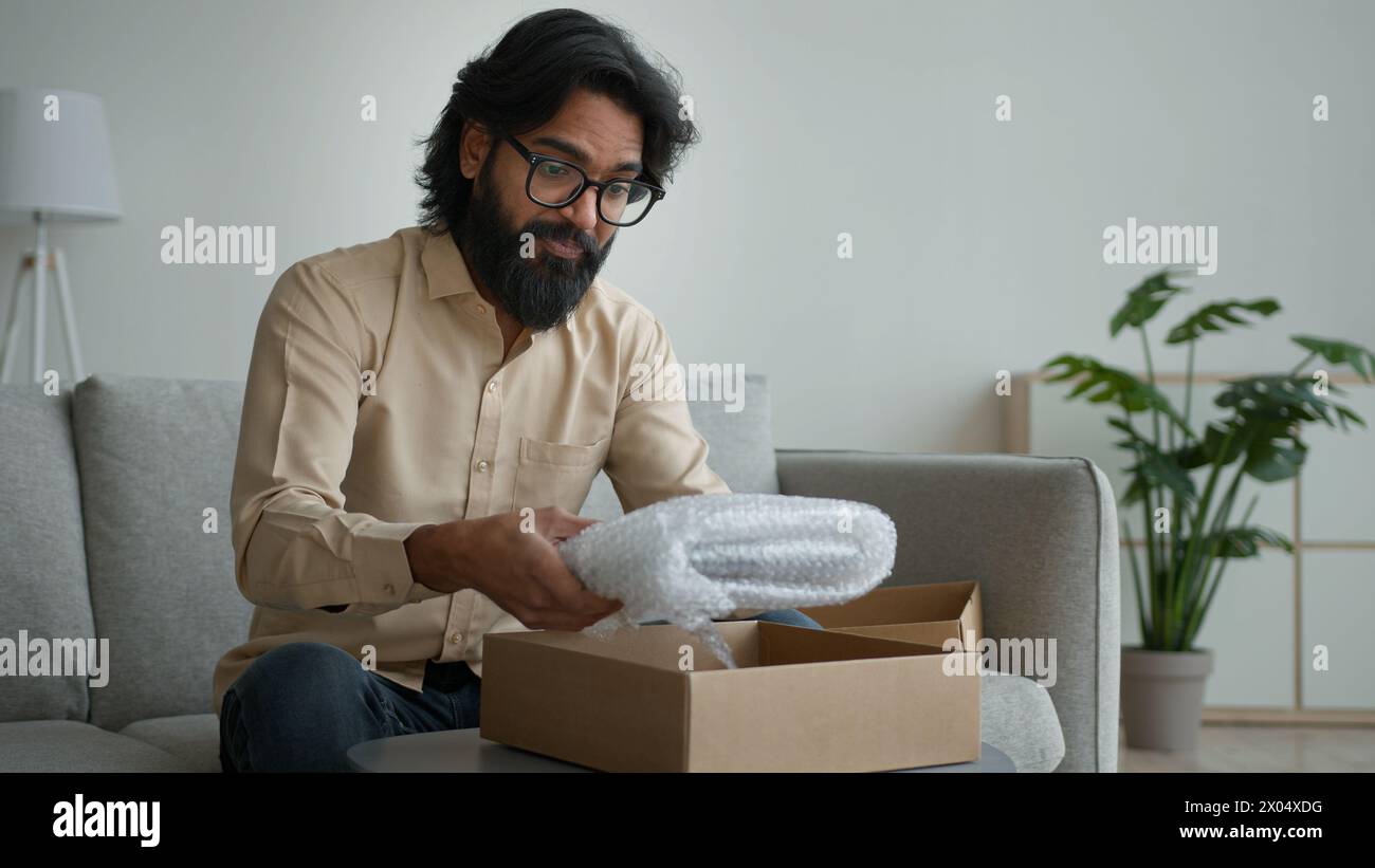 Happy male customer client consumer Arabian indian man guy in glasses ...