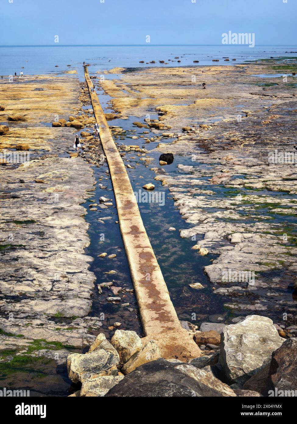 UK, North Yorkshire, Whitby, Outflow Pipe on East Cliff Beach Stock ...