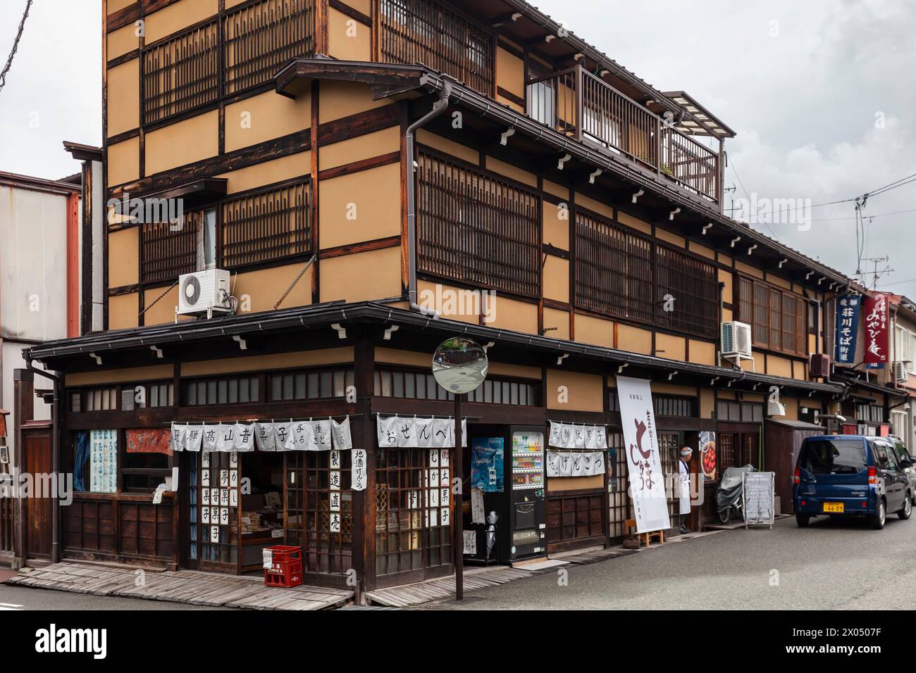 Traditional wooden building, shops and restaurants, street of downtown ...