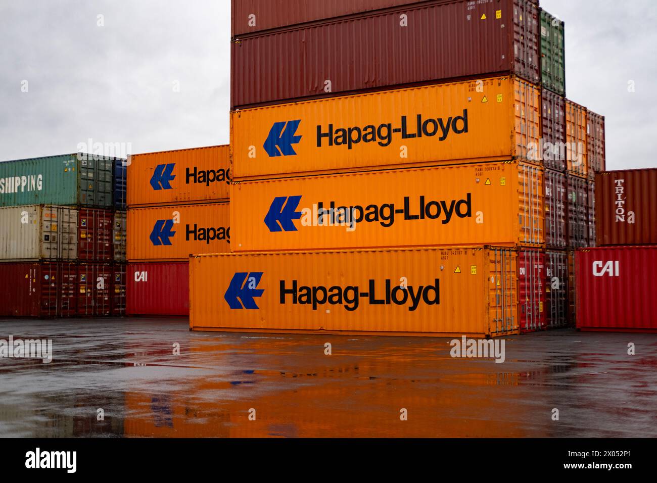 German Hapag-lloyd Shipping containers largest shipping and logistics company stacked in port ...