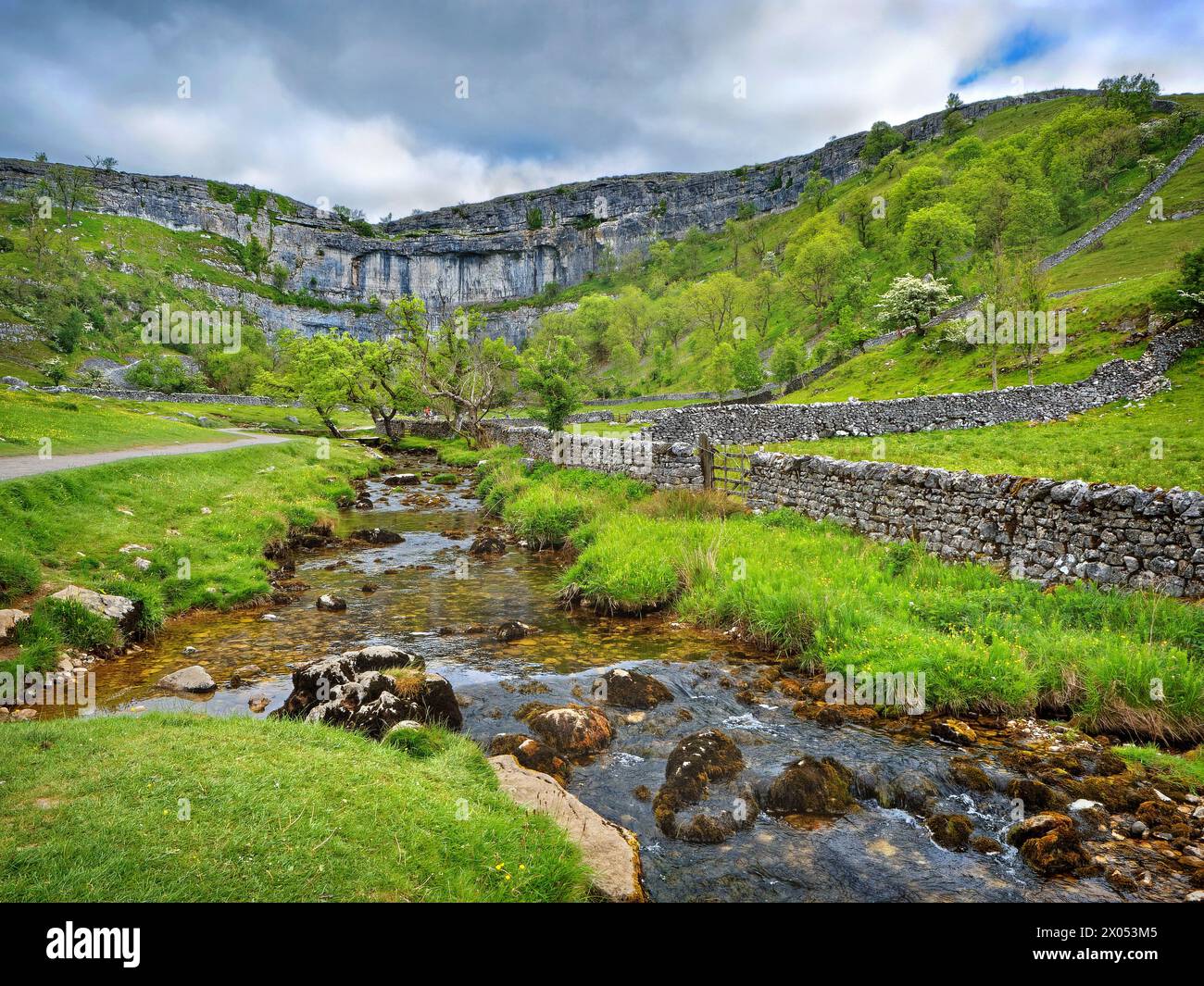 UK, North Yorkshire, Malham, Malham Cove and Malham Beck Stock Photo ...