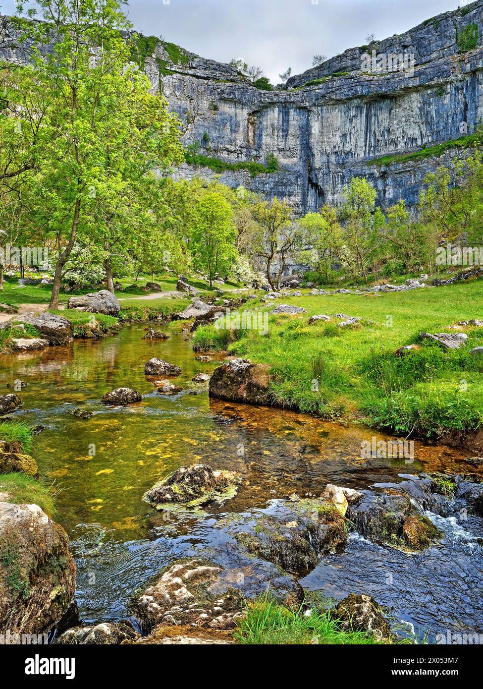 UK, North Yorkshire, Malham, Malham Cove and Malham Beck Stock Photo ...
