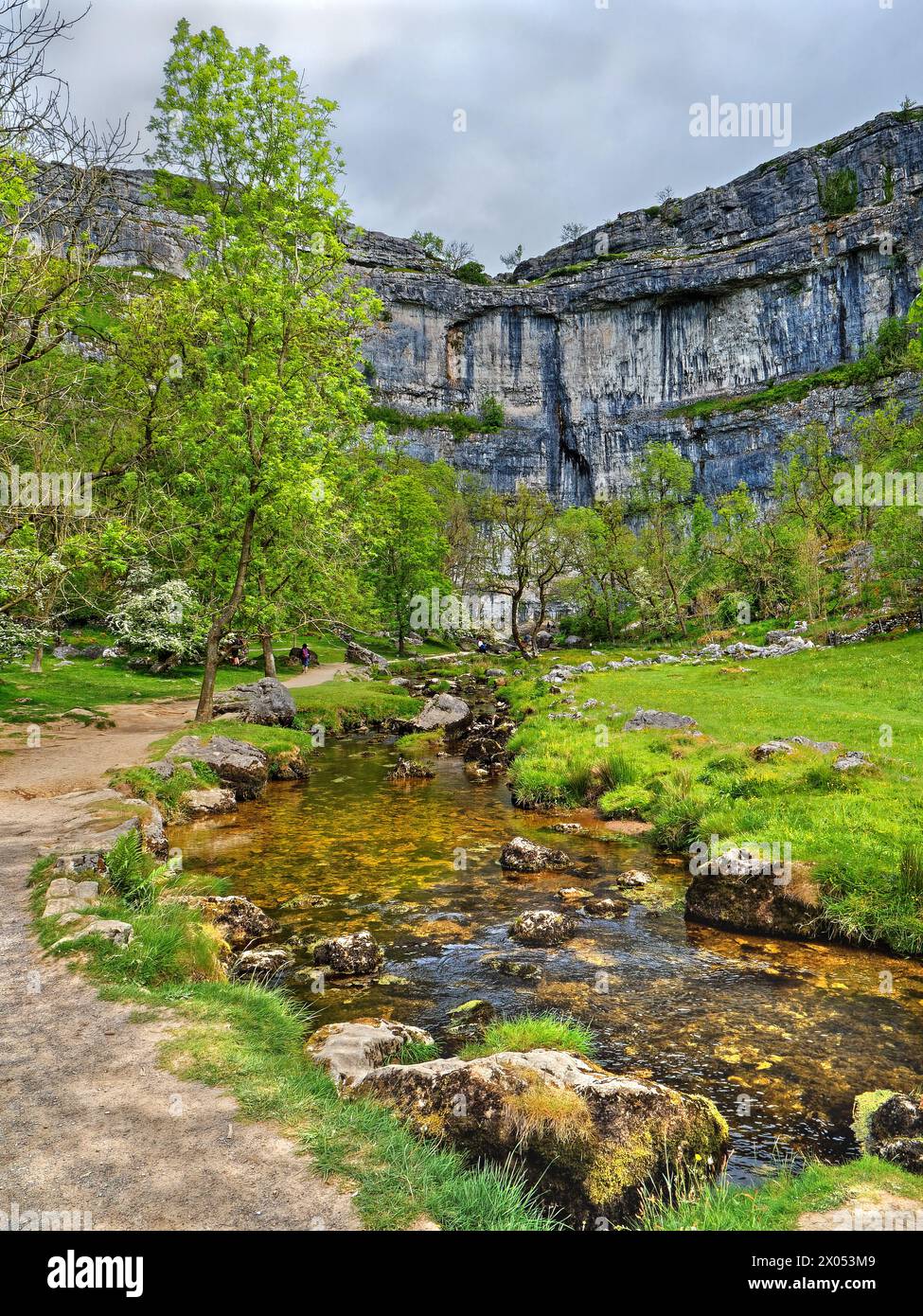 UK, North Yorkshire, Malham, Malham Cove and Malham Beck Stock Photo ...