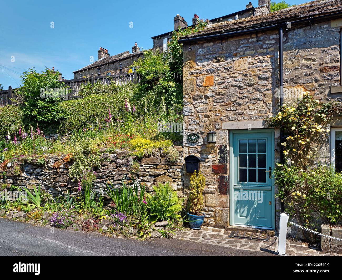 UK, North Yorkshire, Grassington, Scar Street, Crag Cottage Stock Photo ...
