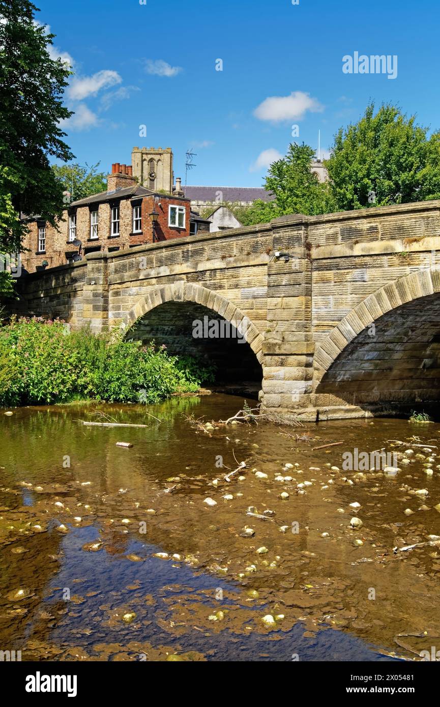 UK, North Yorkshire, Ripon Cathedral, Bondgate Bridge and River Skell ...