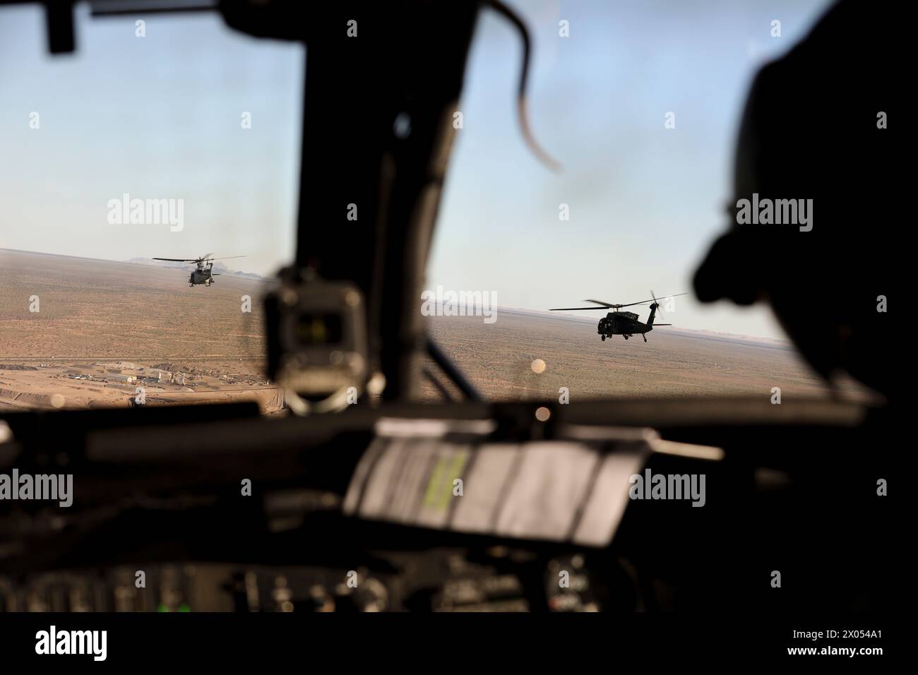 A U.S. Marine Corps UH-1Y Venom helicopter, left, assigned to Marine ...