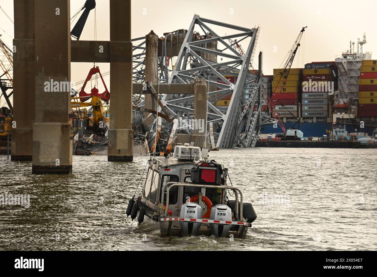 A Unified Command survey vessel crew conducts survey operations near ...