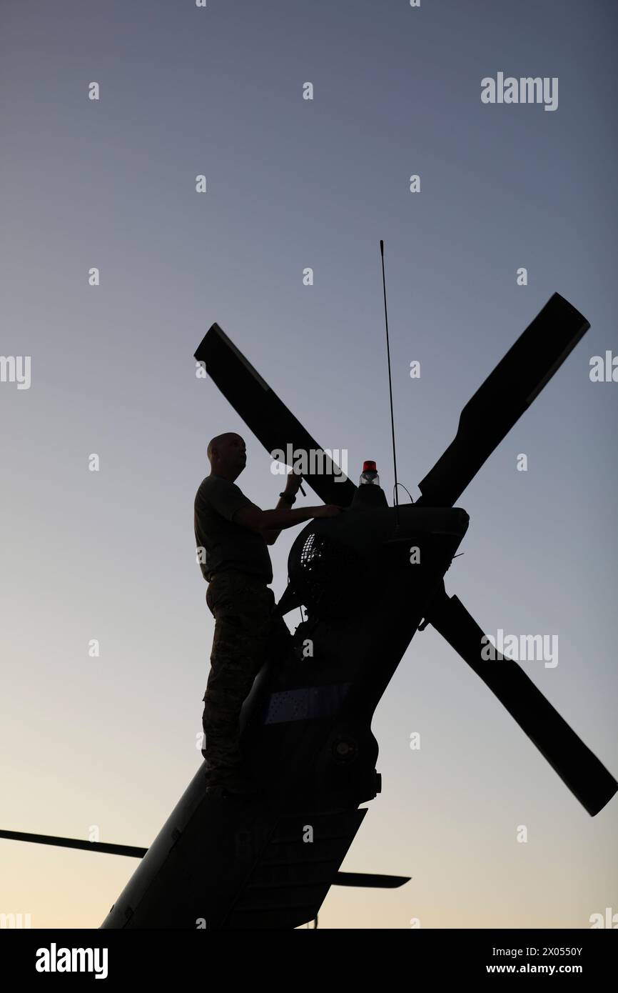 Alaska Army National Guard Staff Sgt. Tanner Lauderback, UH-60L Black ...