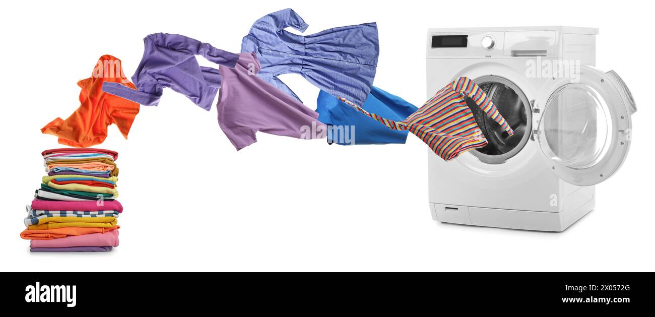 Washing machine and flying clothes on white background Stock Photo - Alamy