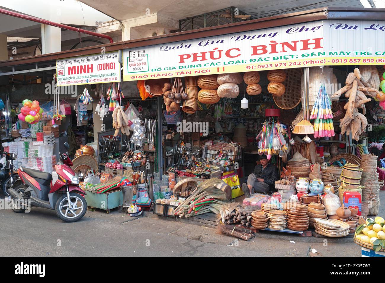 "Phuc Binh" market traders of brushes, woven goods, hats and tools near ...