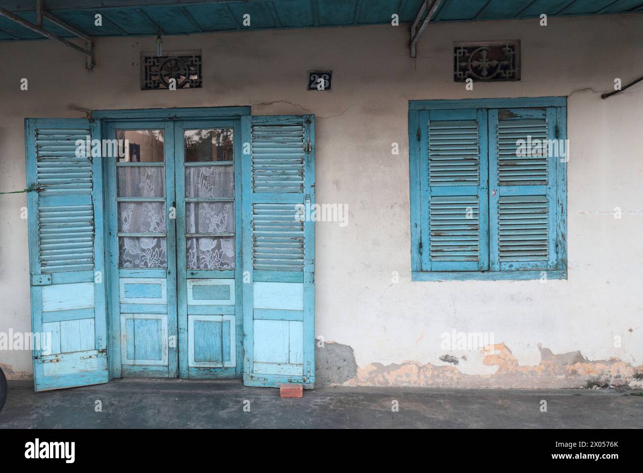 Old French-style building with blue shutters, near Cho Da Lat (Dalat ...