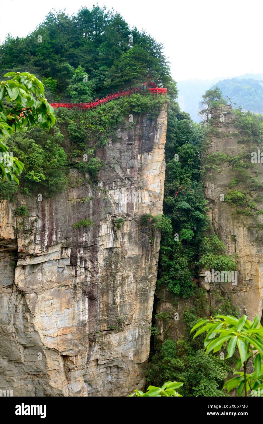 Red blessing ribbons line a mountaintop trail in Zhangjiajie National ...