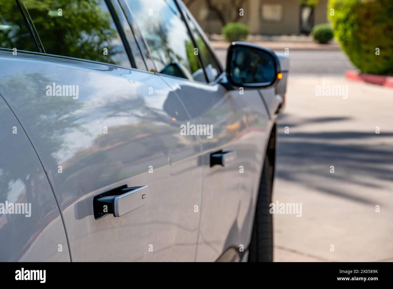 Phoenix, Arizona, USA - 3.23.2024: automatic recessed door handles a ...