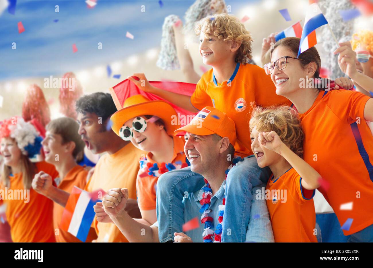 Netherlands football supporter on stadium. Dutch fans on soccer pitch ...