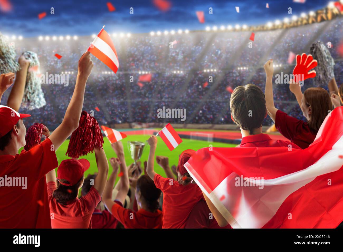 Austria football supporter on stadium. Austrian fans on soccer pitch watching team play. Group ...