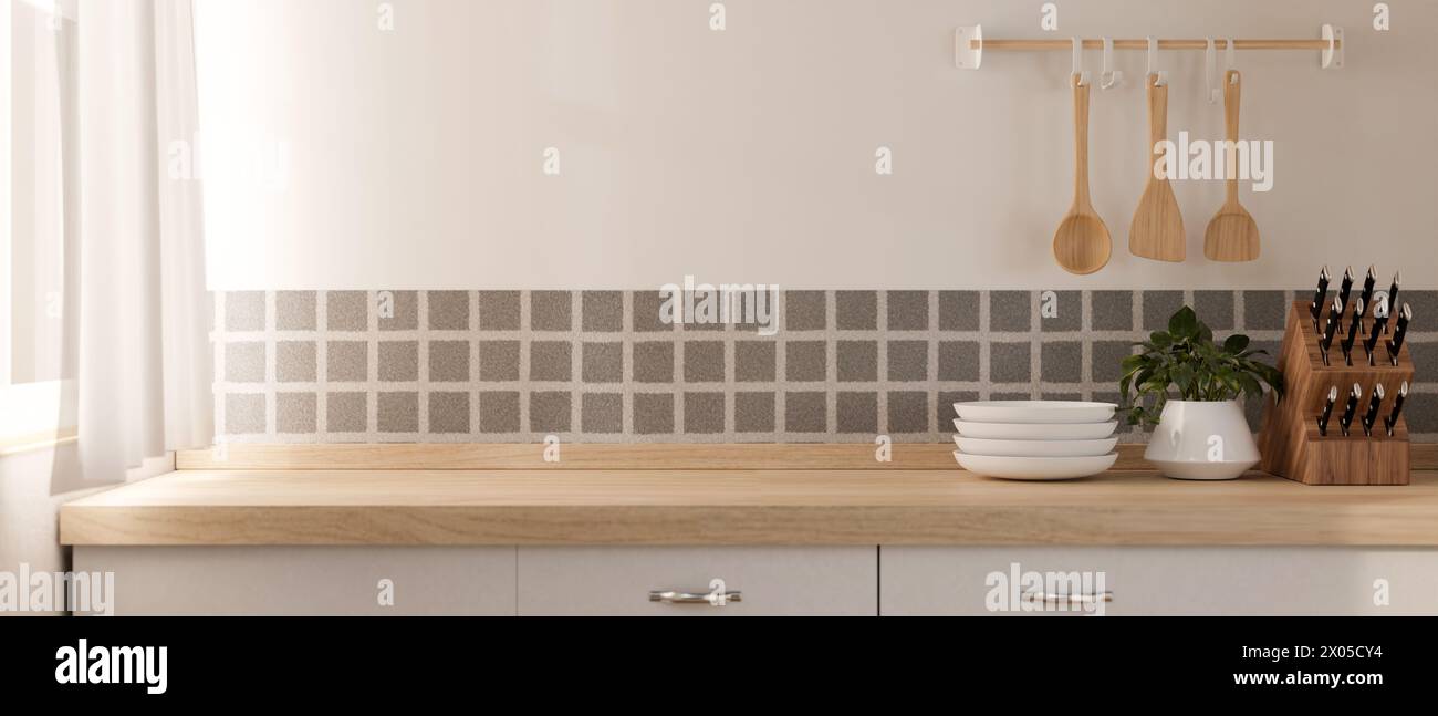 A minimalist wooden kitchen countertop with kitchenware and a space for ...