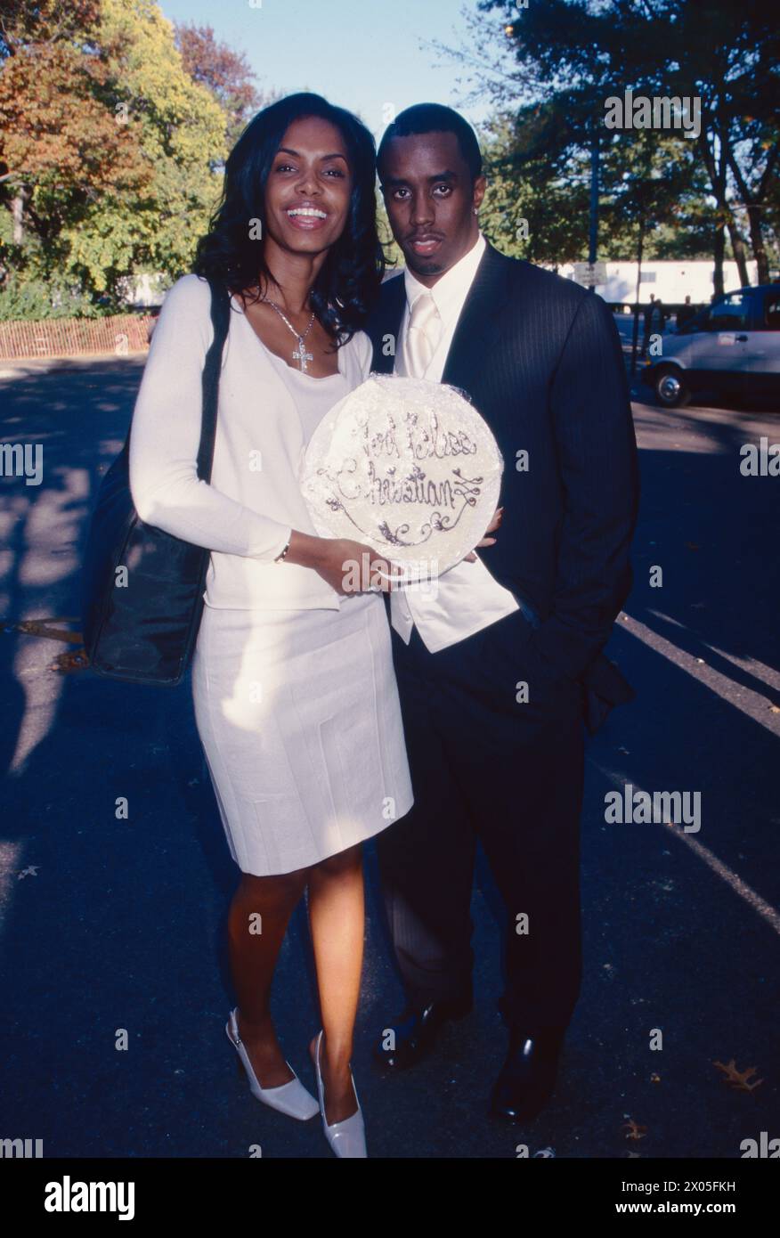 Kim Porter and Sean "Puffy" Combs attend the christening party for ...