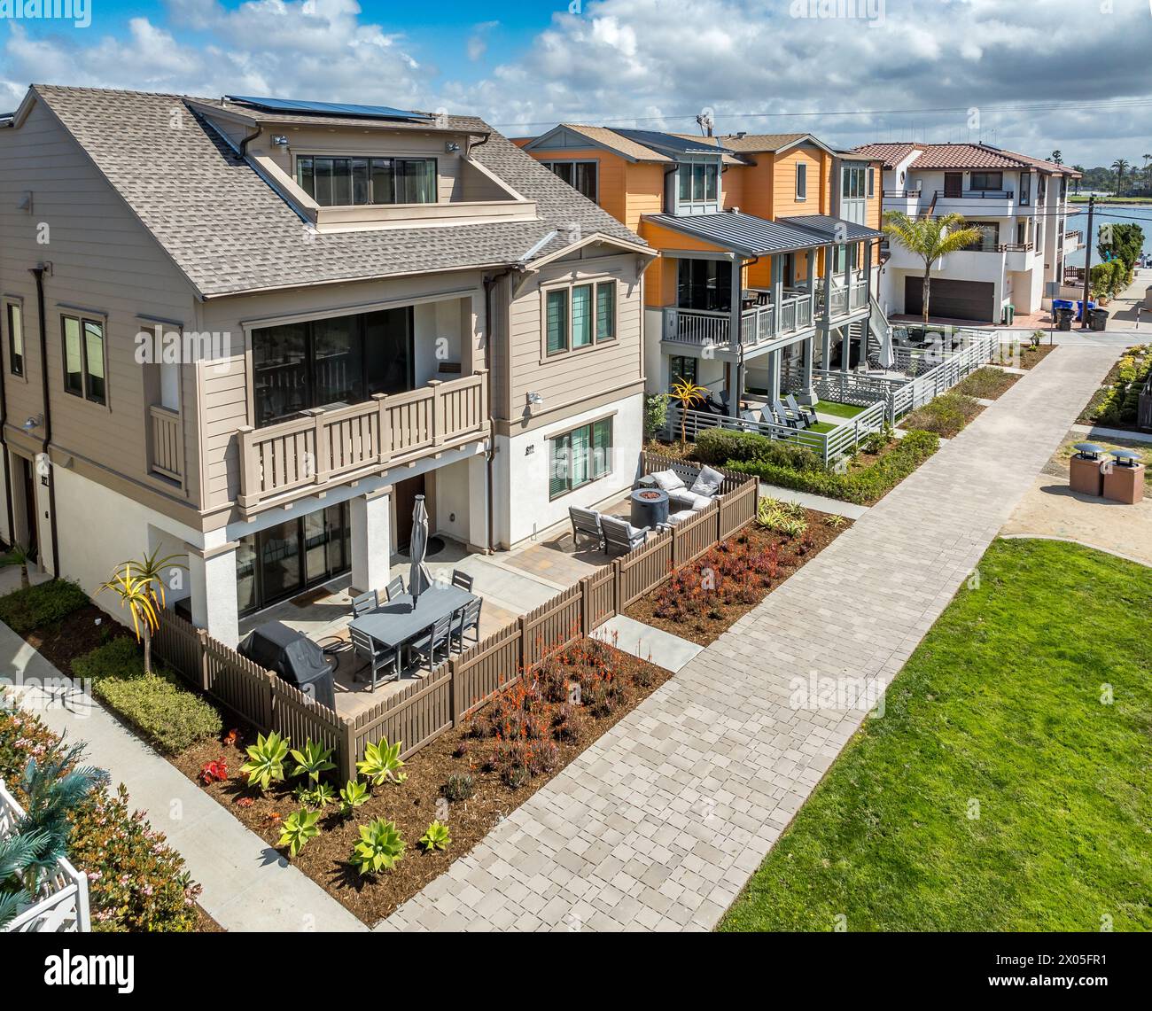 Aerial close up view of residential luxury single family beach houses ...