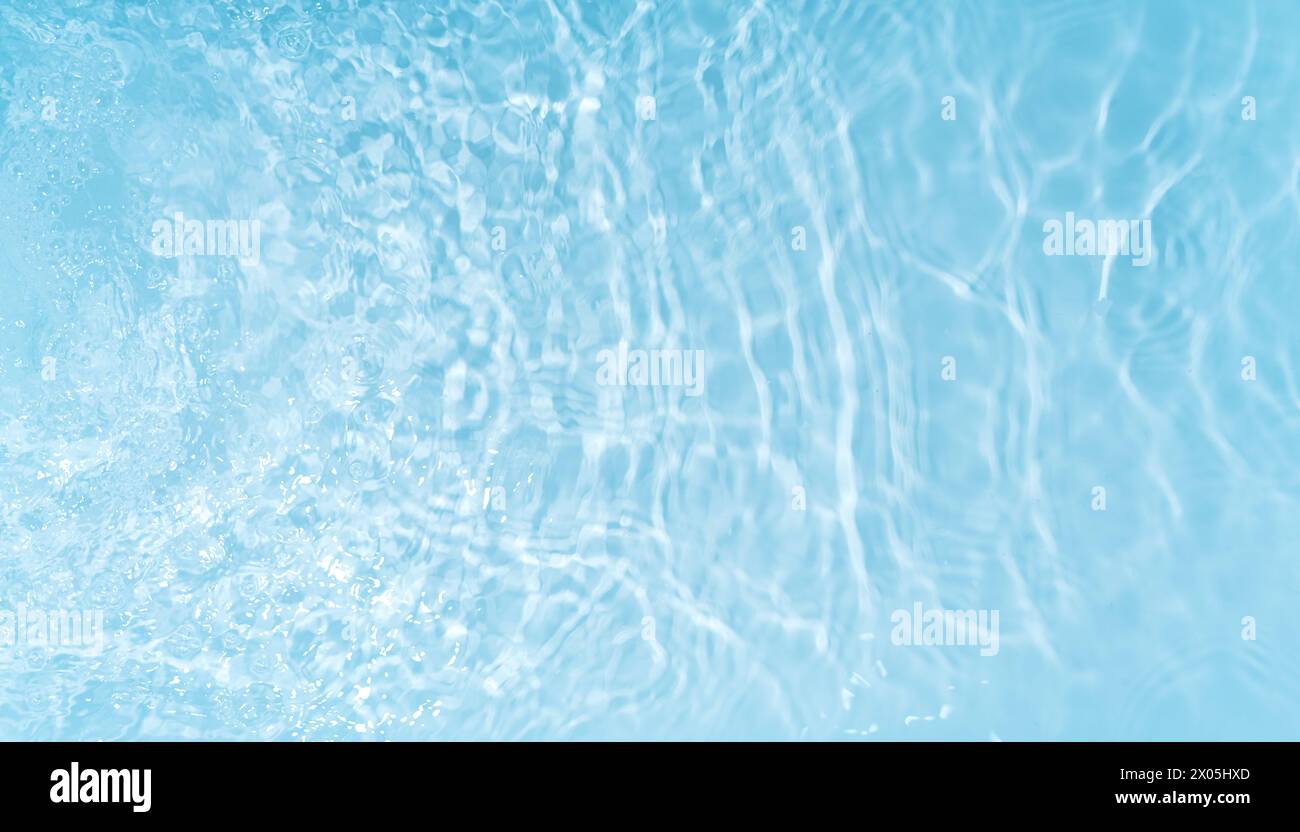 Stream of water flows from a faucet into a swimming pool Stock Photo ...