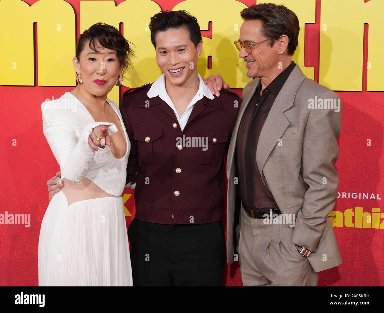 (L-R) Sandra Oh, Hoa Xuande, and Robert Downey Jr. at the HBO Original Limited Series' THE ...