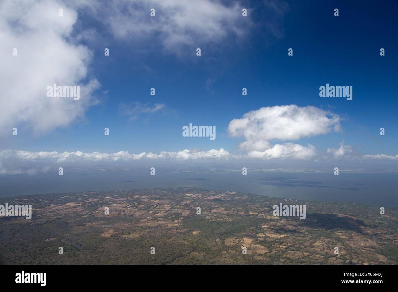 Views across to the horizon as hikers trek to the dramatic peak of ...