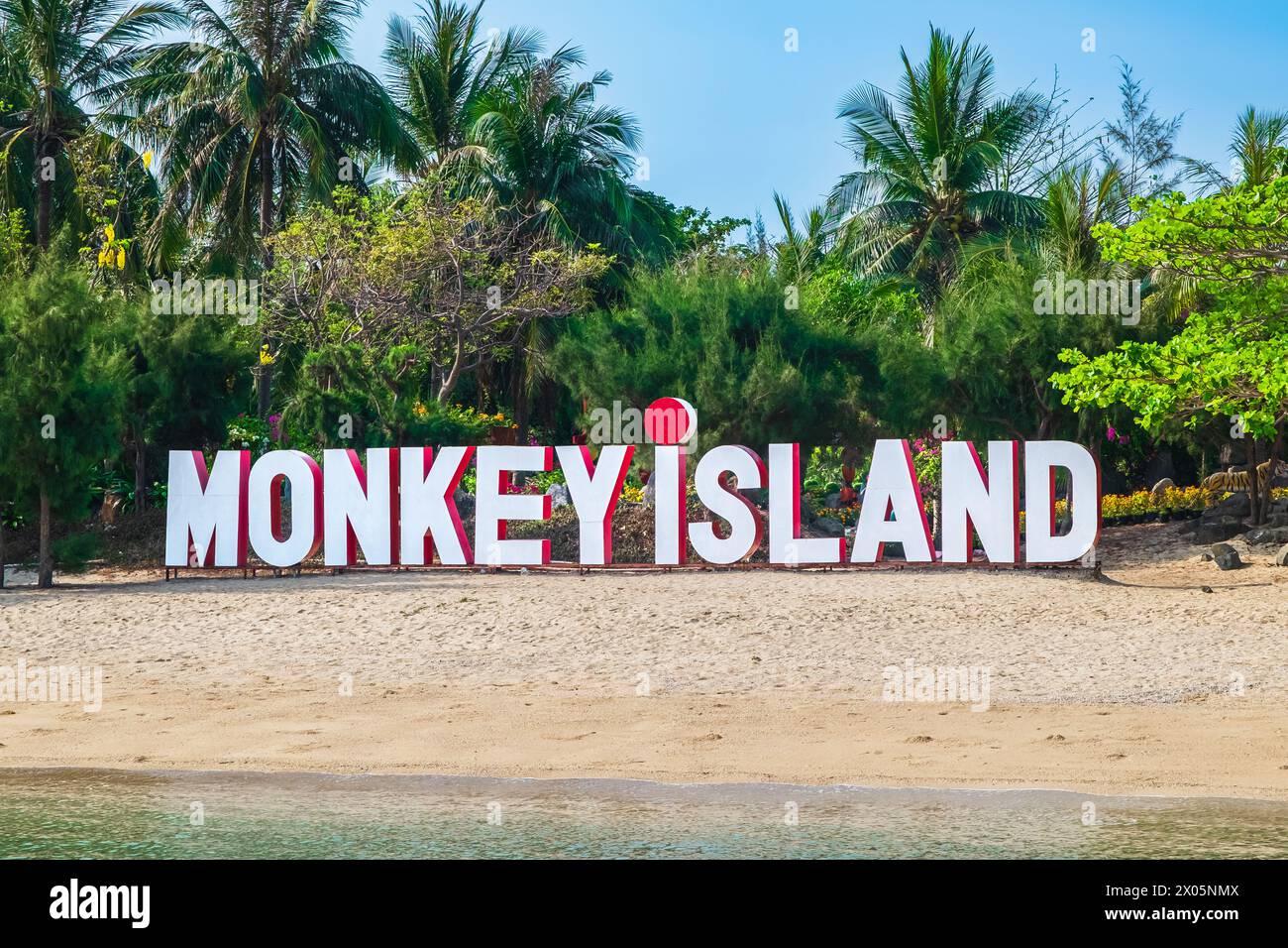 Southeast Asia. Beautiful tropical Monkey island with hut, sandy beach ...