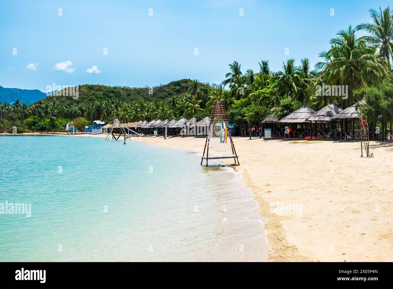 Southeast Asia. Beautiful tropical Monkey island with hut, sandy beach ...