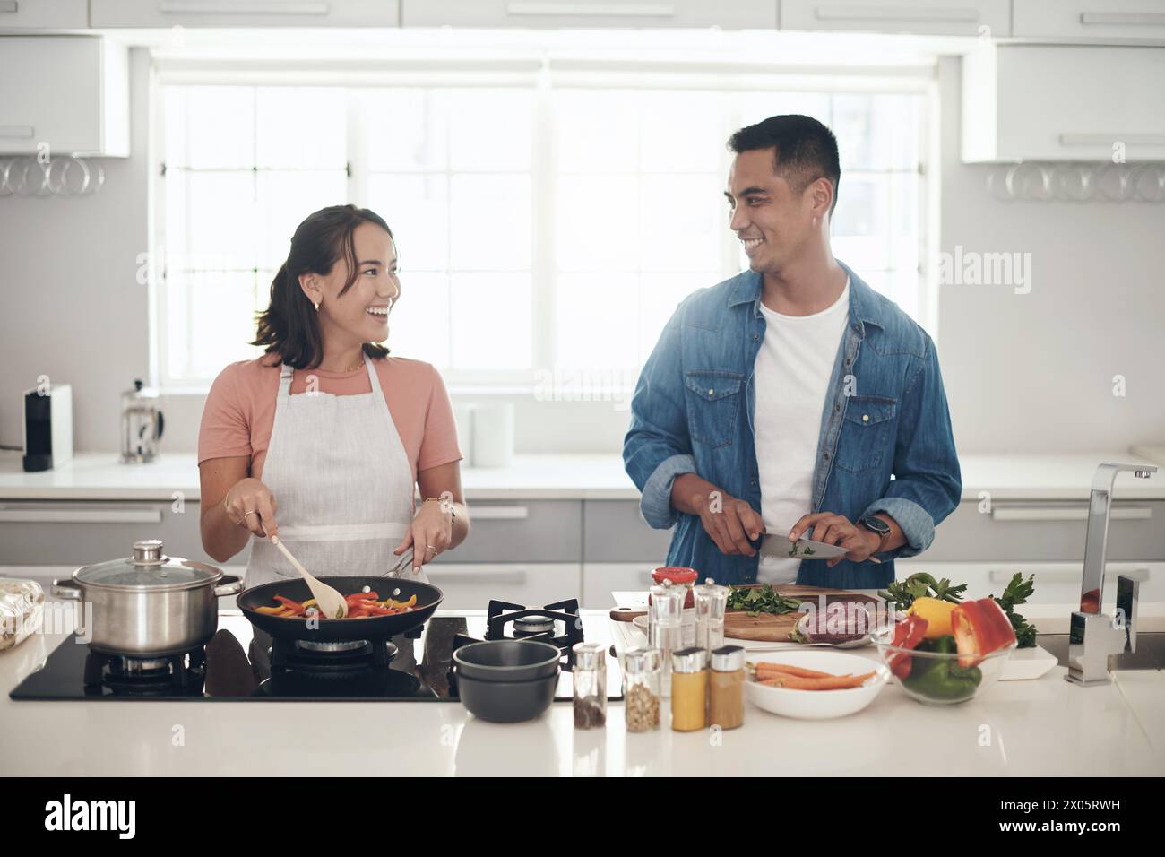Love, cooking and happy couple in kitchen together with healthy food ...