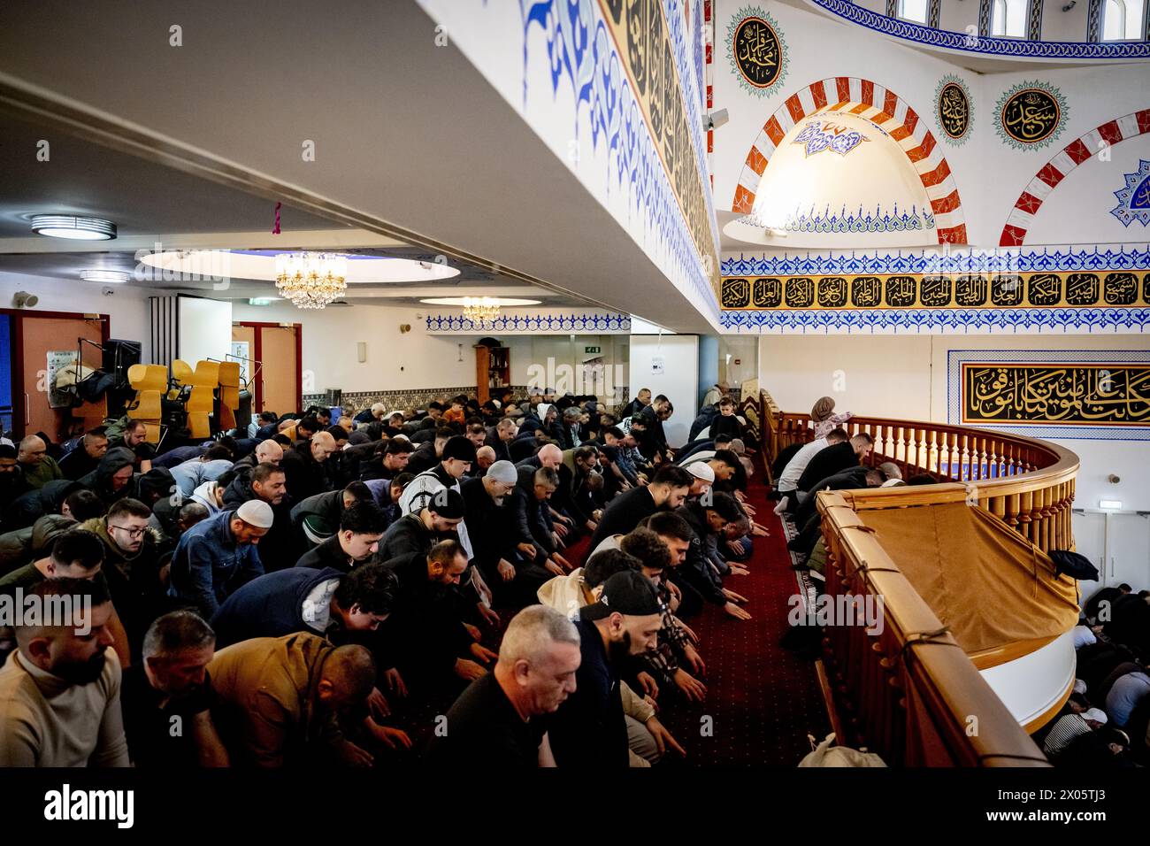 ROTTERDAM - Muslims during morning prayers in the Mevlana Mosque. Eid ...