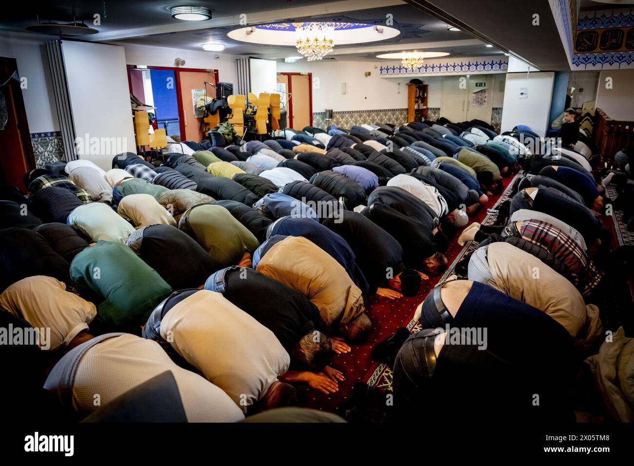 ROTTERDAM - Muslims during morning prayers in the Mevlana Mosque. Eid ...