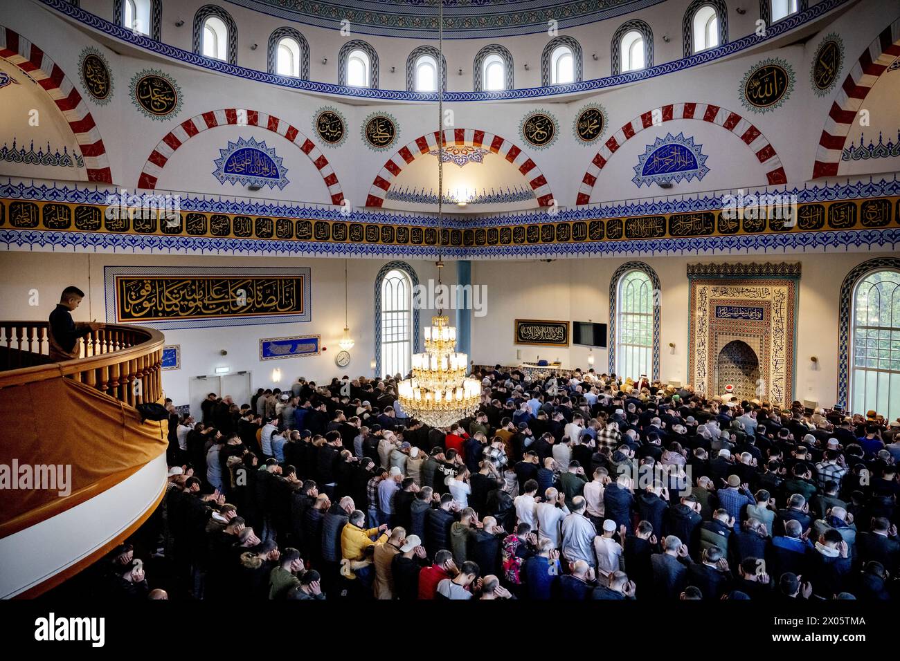 ROTTERDAM - Muslims during morning prayers in the Mevlana Mosque. Eid ...
