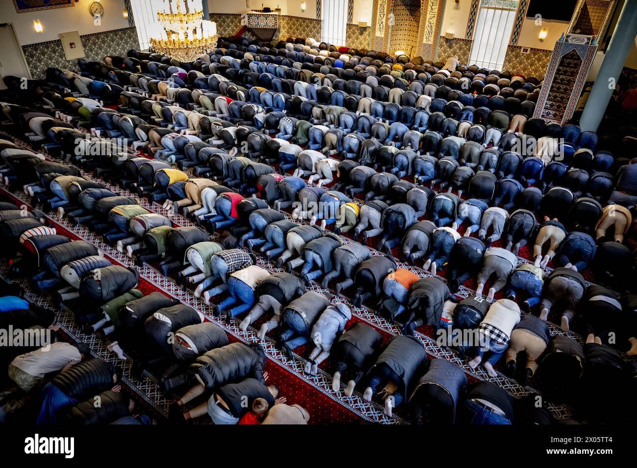 ROTTERDAM - Muslims during morning prayers in the Mevlana Mosque. Eid ...