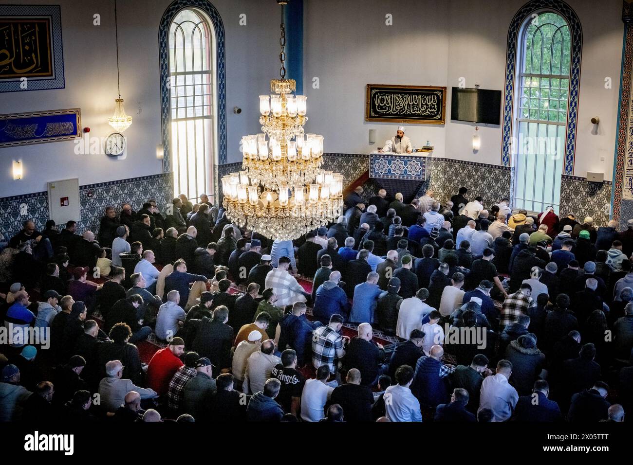 ROTTERDAM - Muslims during morning prayers in the Mevlana Mosque. Eid ...