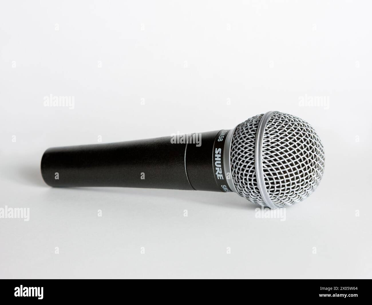 Shure SM58 dynamic microphone isolated on white background Stock Photo ...