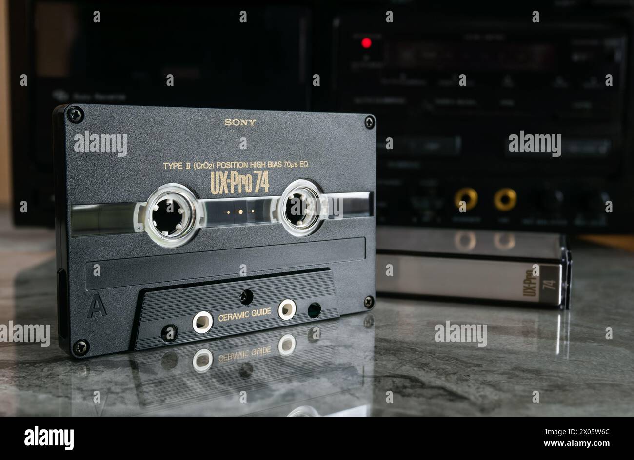 Sony UX-PRO 74 audio cassette with case on polished marble tabletop ...