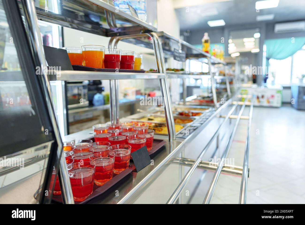 Colorful Array of Fruit Juice Cups on a Serving Cart in a Cafeteria ...