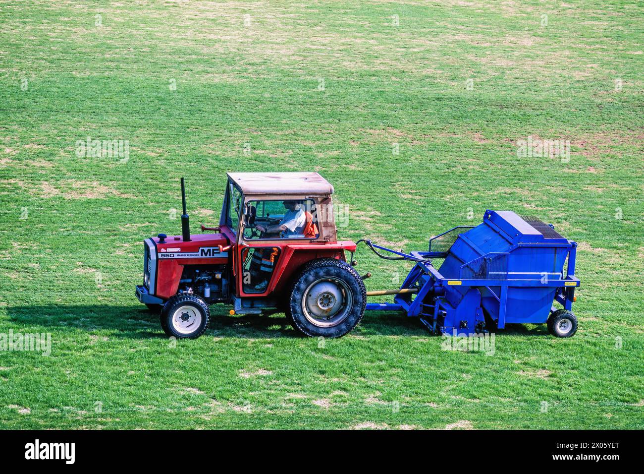 Working man cutting high grass hi-res stock photography and images - Alamy