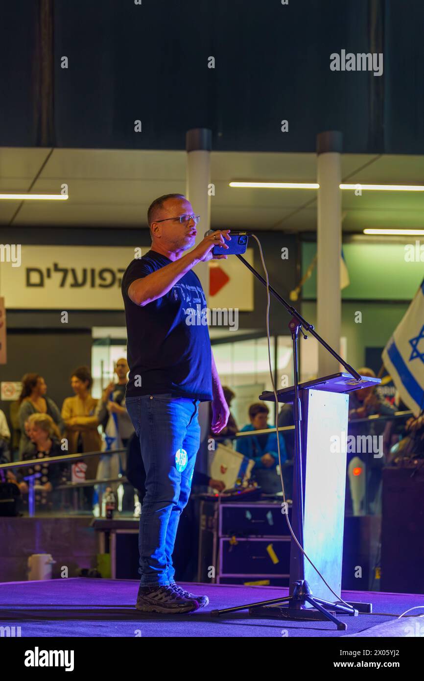 Haifa, Israel - April 06, 2024: Dan Adin speaks to the crowd, part of a ...