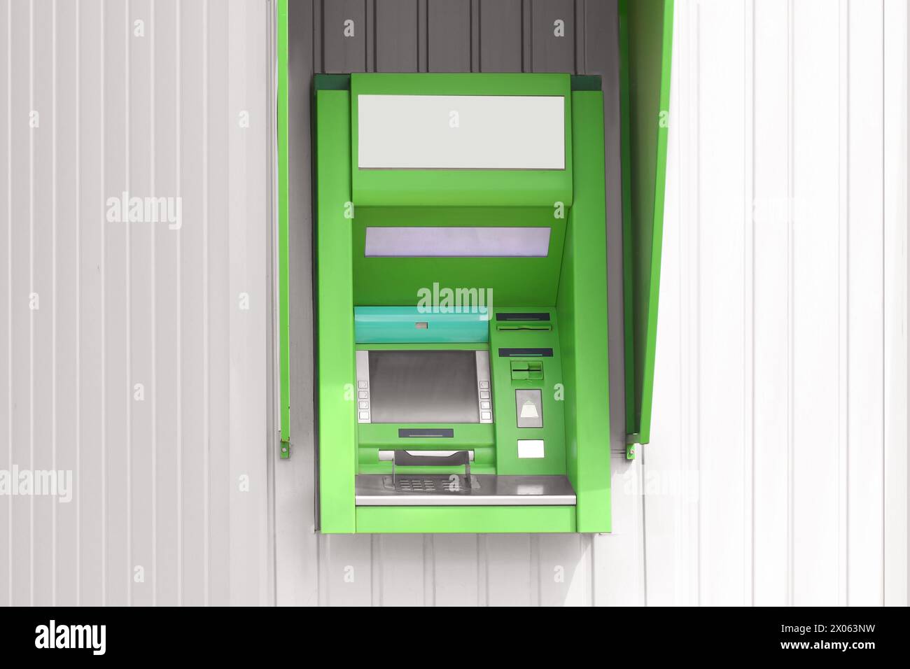 Modern automated cash machine with screen outdoors Stock Photo - Alamy