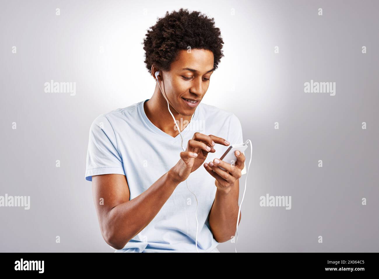 Black man, listening to music and smartphone with audio, radio and live ...